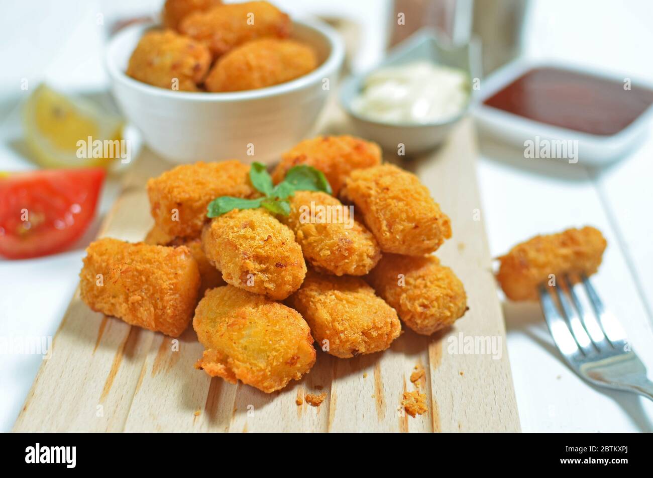 Fried fish nugget and sauce Stock Photo - Alamy