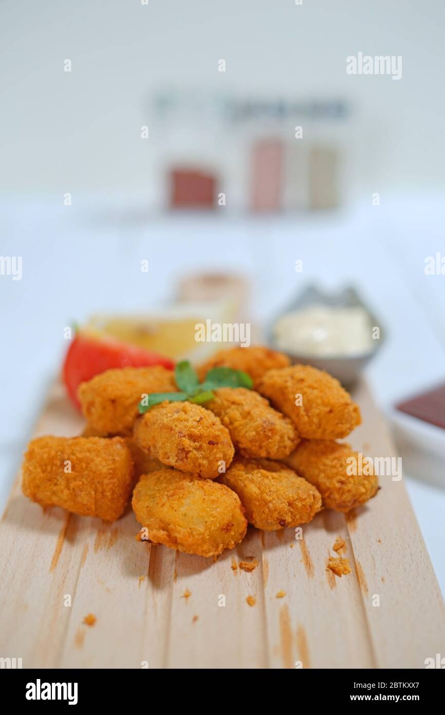 Fried fish nugget and sauce Stock Photo - Alamy
