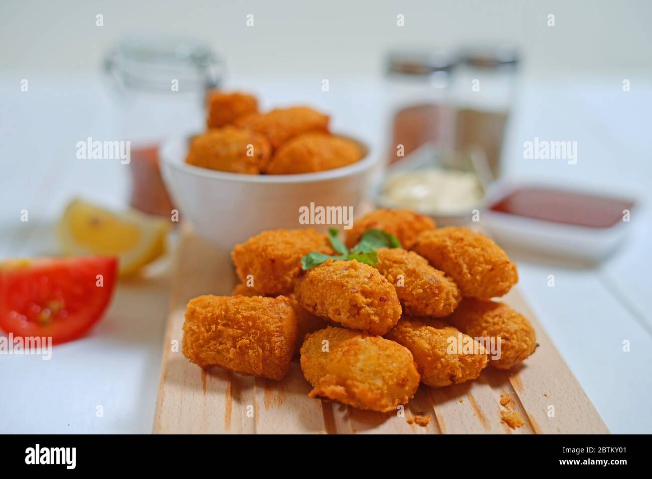 Fried fish nugget and sauce Stock Photo - Alamy