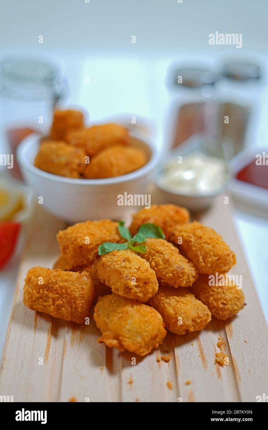 Fried fish nugget and sauce Stock Photo - Alamy