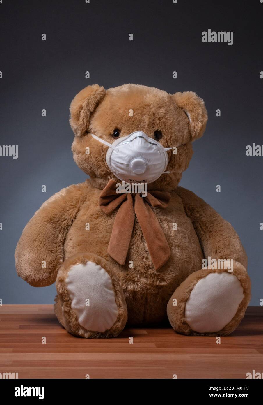 Teddy bear with protective mouth mask Stock Photo - Alamy