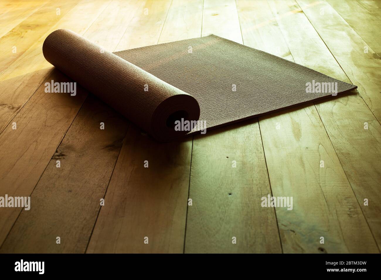 yoga mat on natural wood floor with sunlight relaxation wellness ...