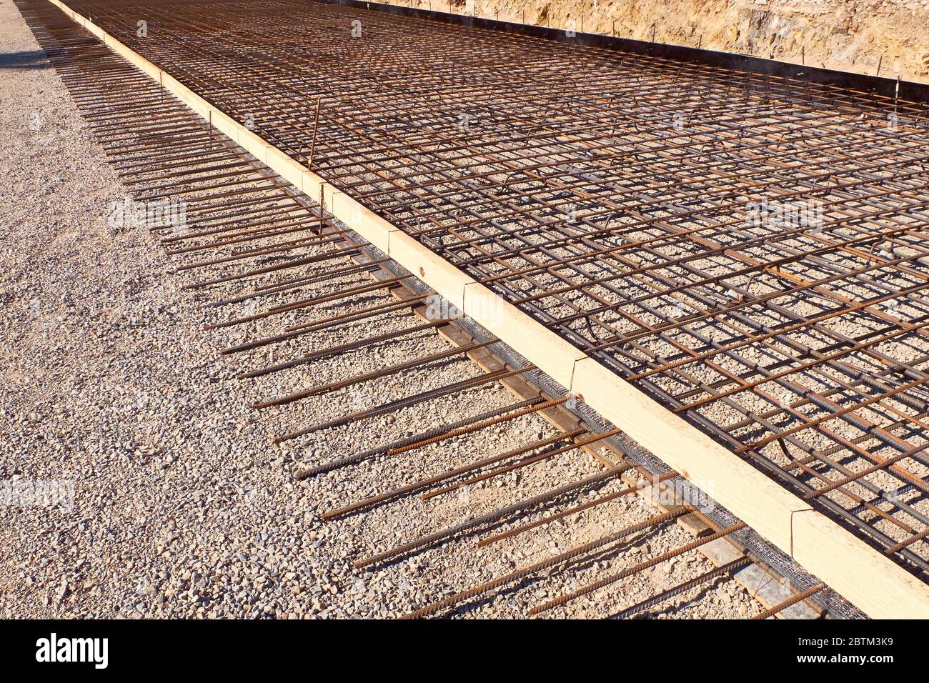 Metal reinforcement of road concrete foundation plate Stock Photo - Alamy