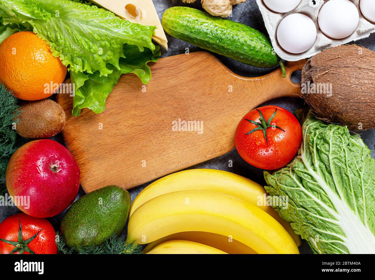 Conceptual image of a balance of healthy food with vegetables and ...