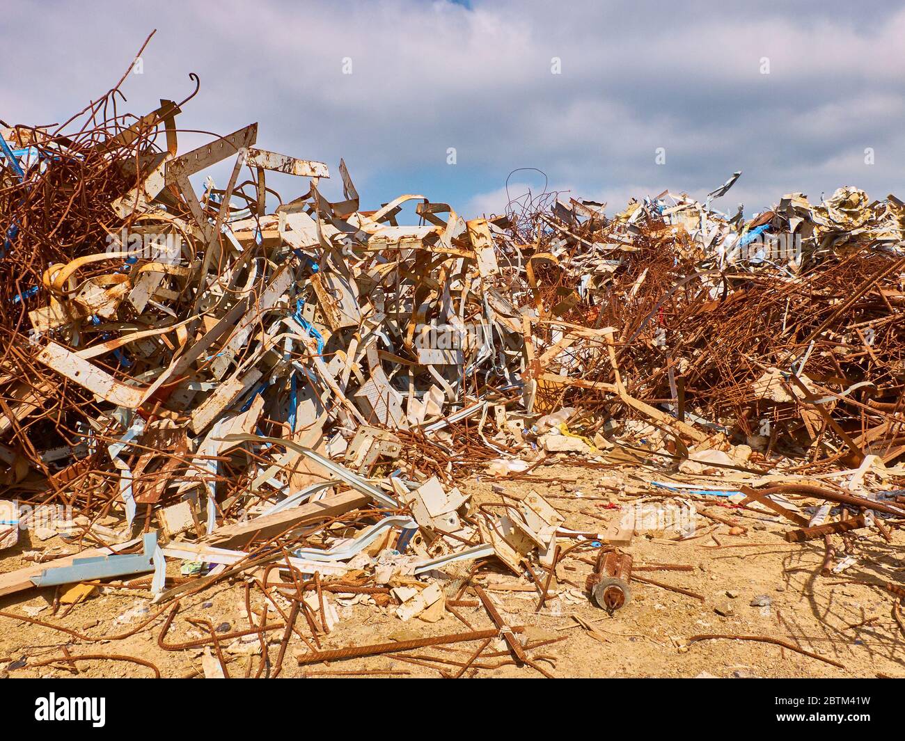 metal reinforcement parts and other construction debris at construction ...
