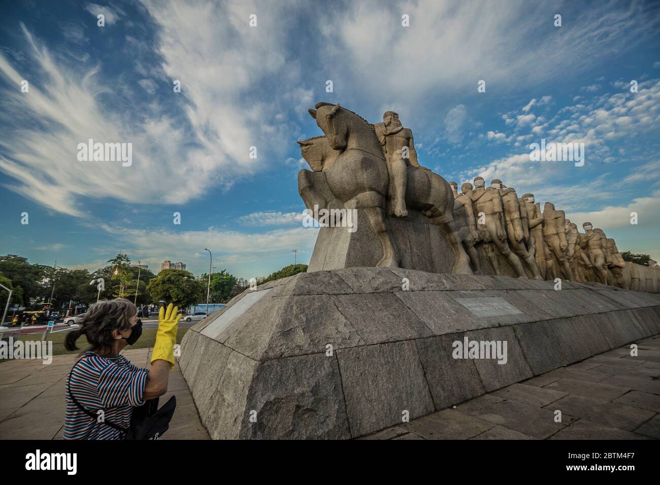View of the Monument to the Banderias adorned with protective mask ...