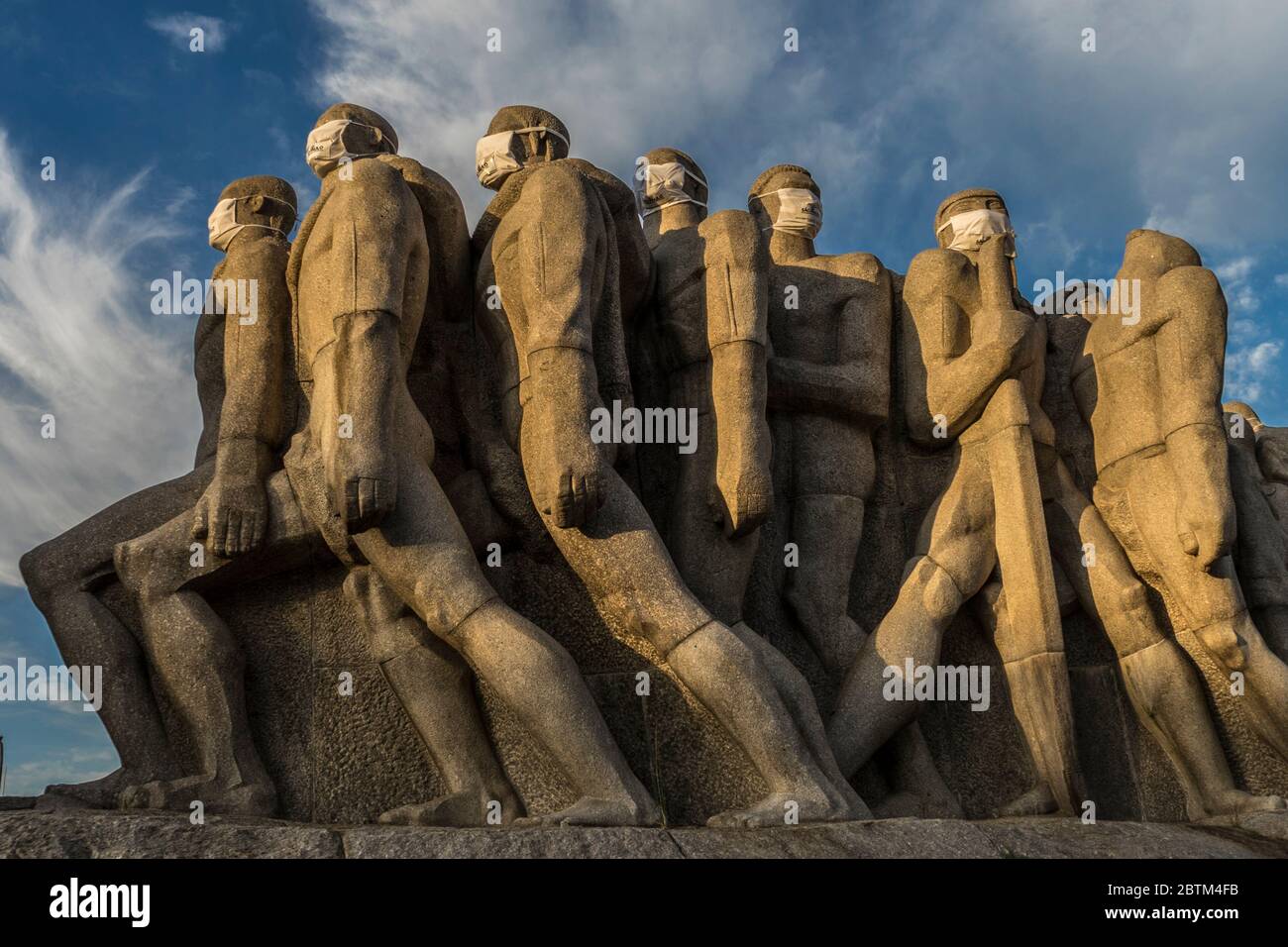 View of the Monument to the Banderias adorned with protective mask ...