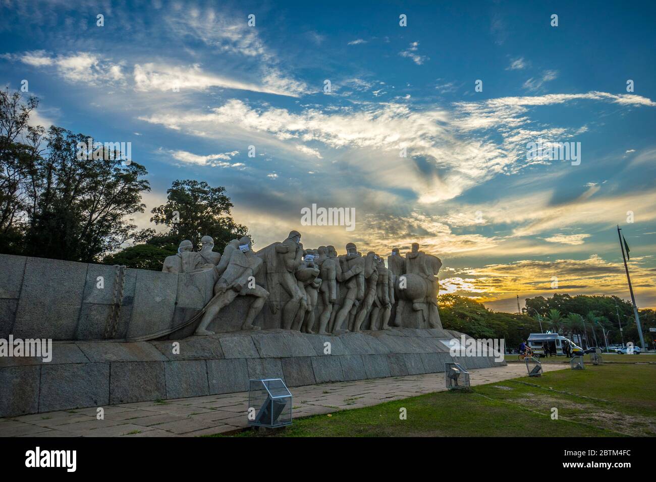 View of the Monument to the Banderias adorned with protective mask ...