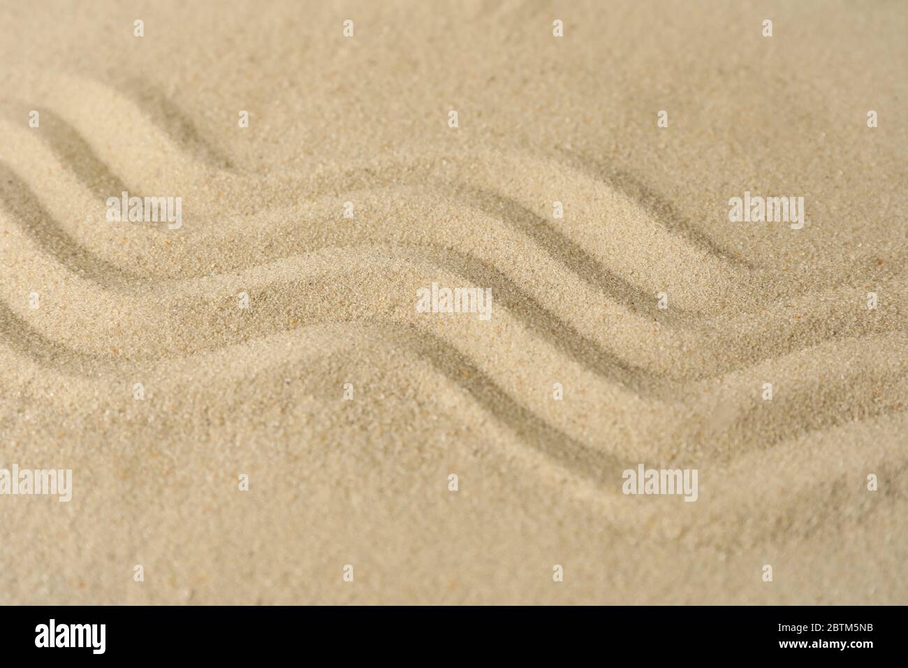Sand background with patterns, top view. Zen concept Stock Photo - Alamy