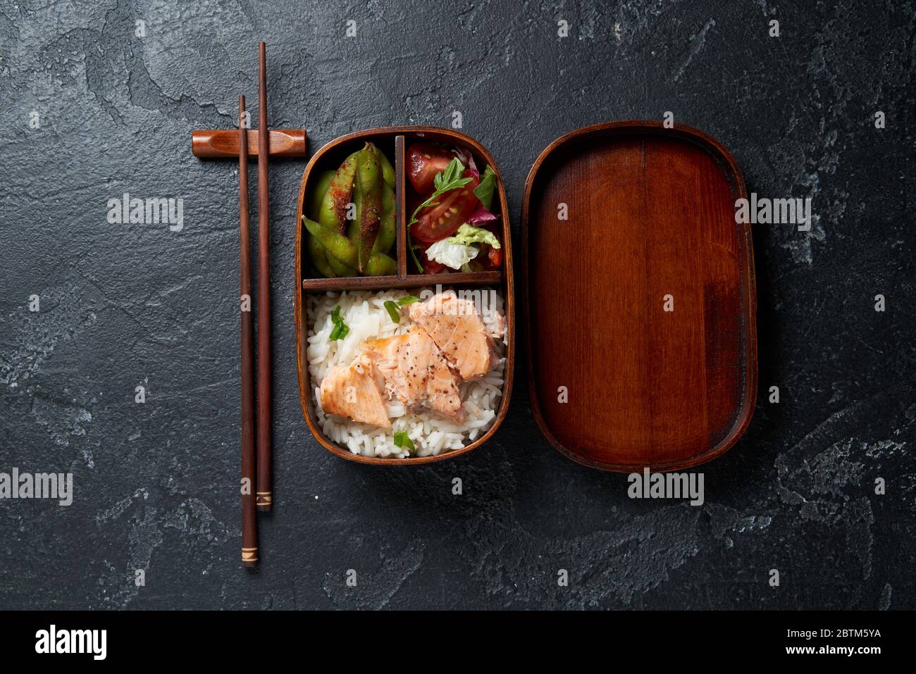 Japanese lunch bento box. Take away concept on stone background Stock ...