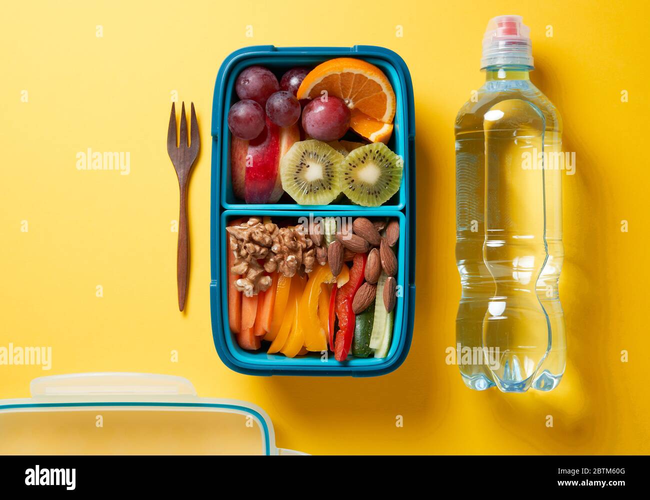 Top View of Full Lunch Box with Fuits, Vegetables and nuts. Healthy ...