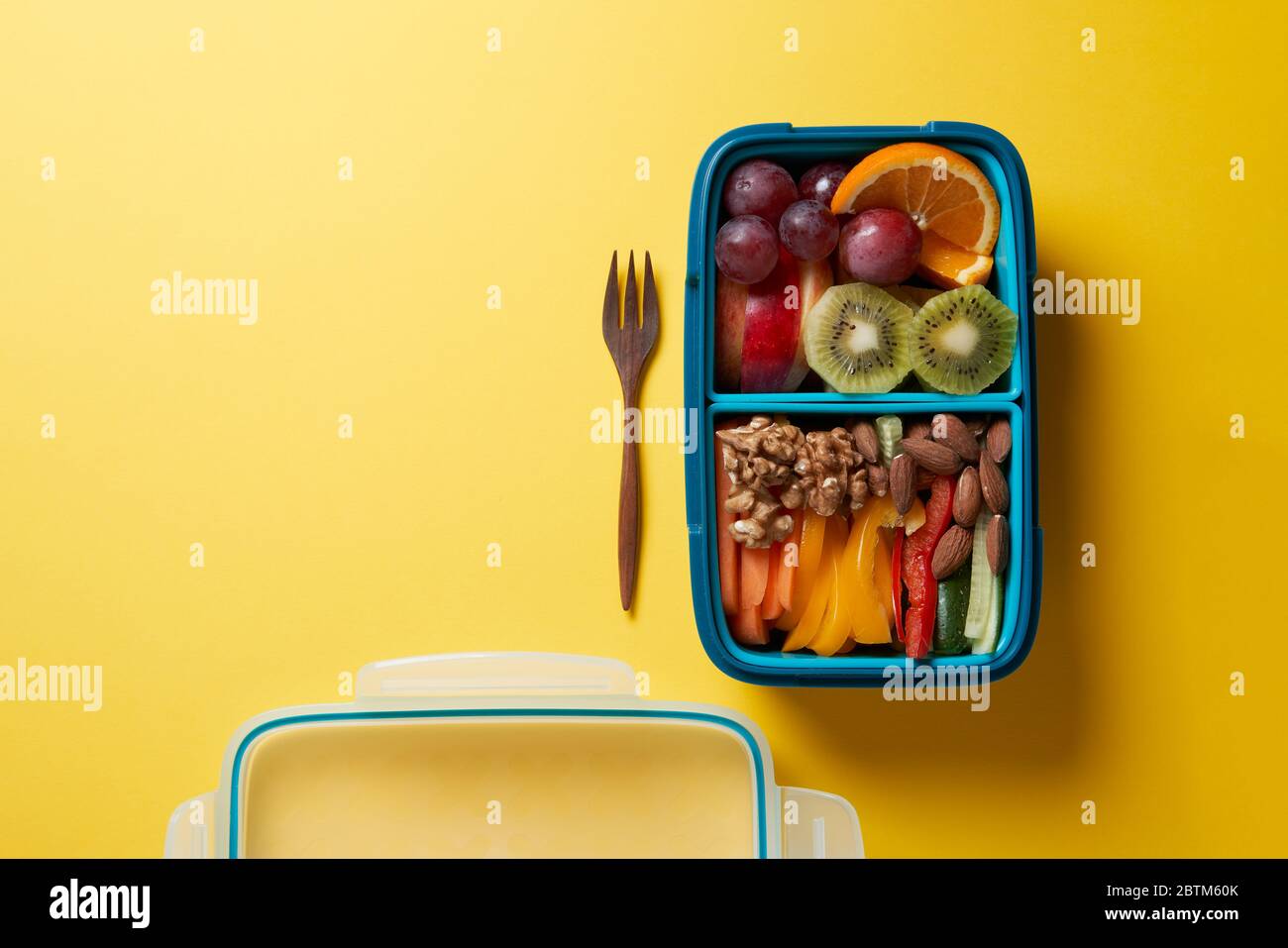 Top View of Full Lunch Box with Fuits, Vegetables and nuts. Healthy ...