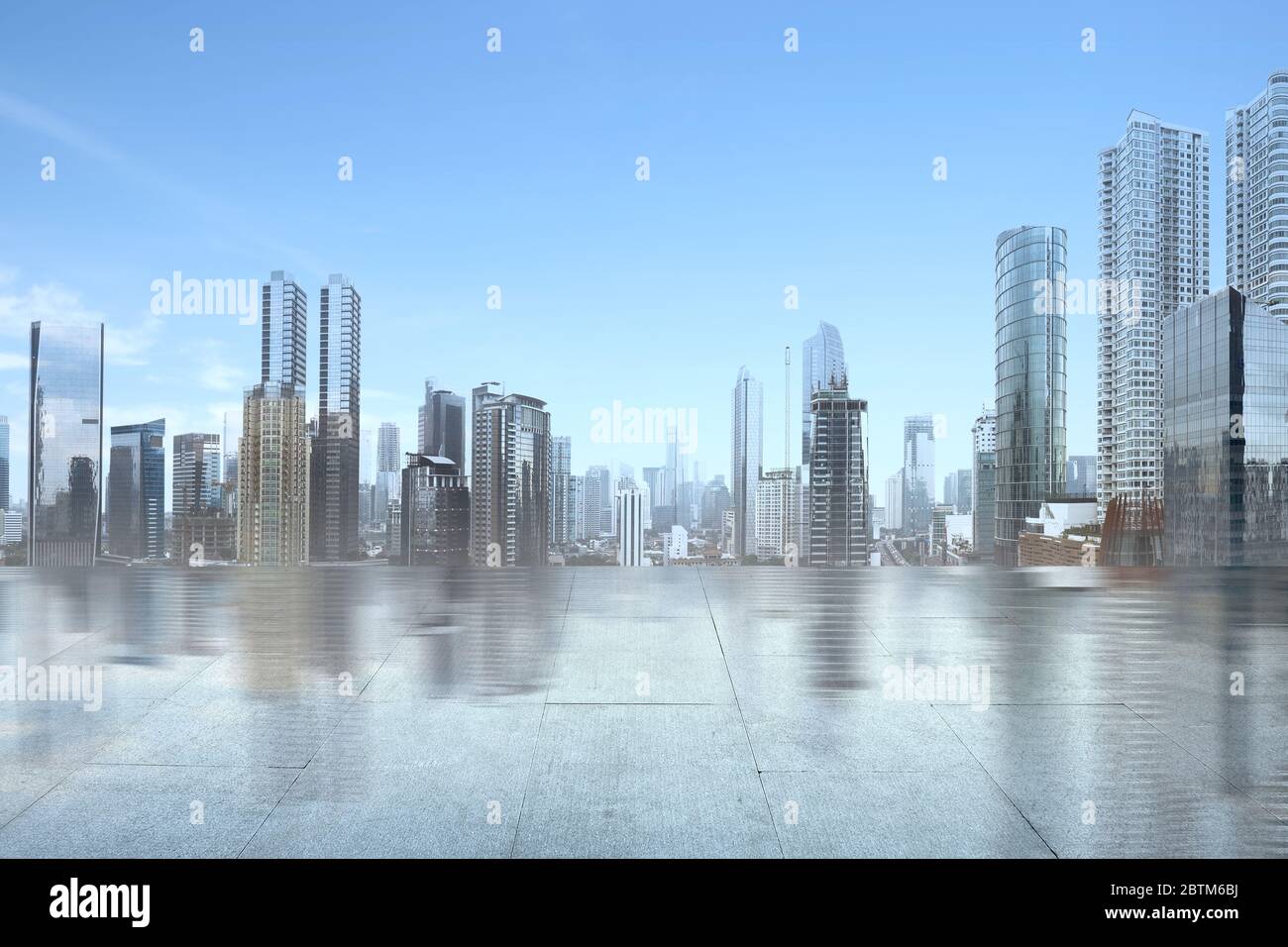 Empty terrace with modern cityscapes and blue sky background Stock ...
