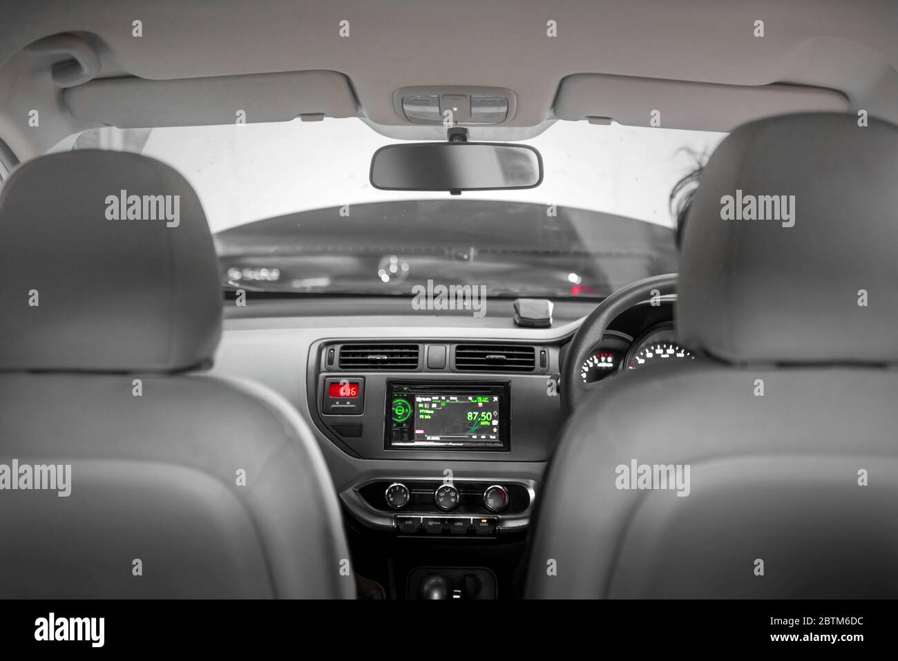 Man driving car with dashboard display isolated over white background ...