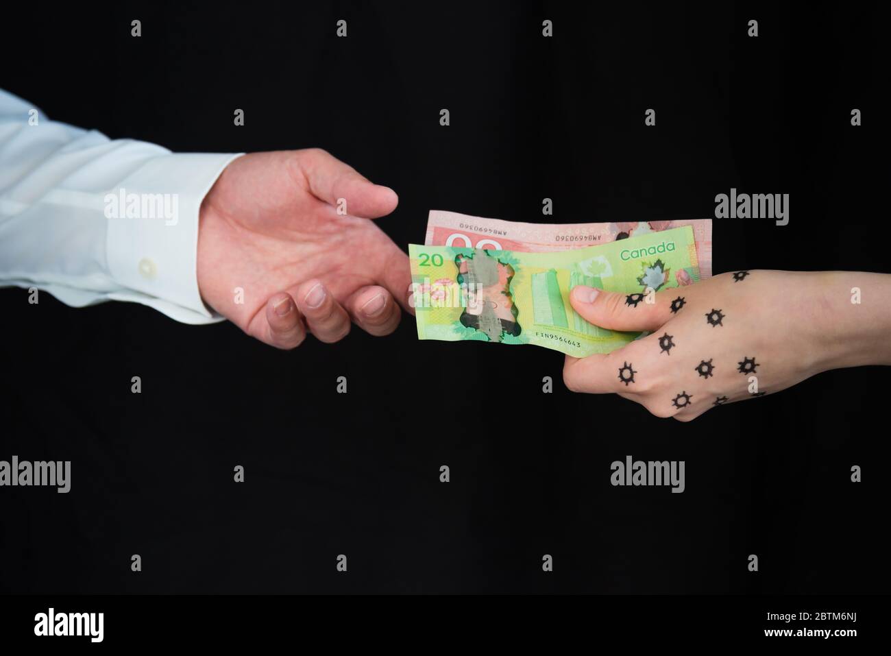 Canadian Money Hand High Resolution Stock Photography and Images - Alamy
