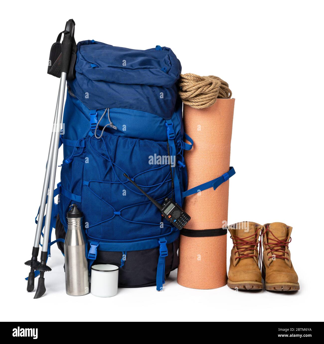 Blue hiking backpack with fitness mat isolated on white Stock Photo - Alamy