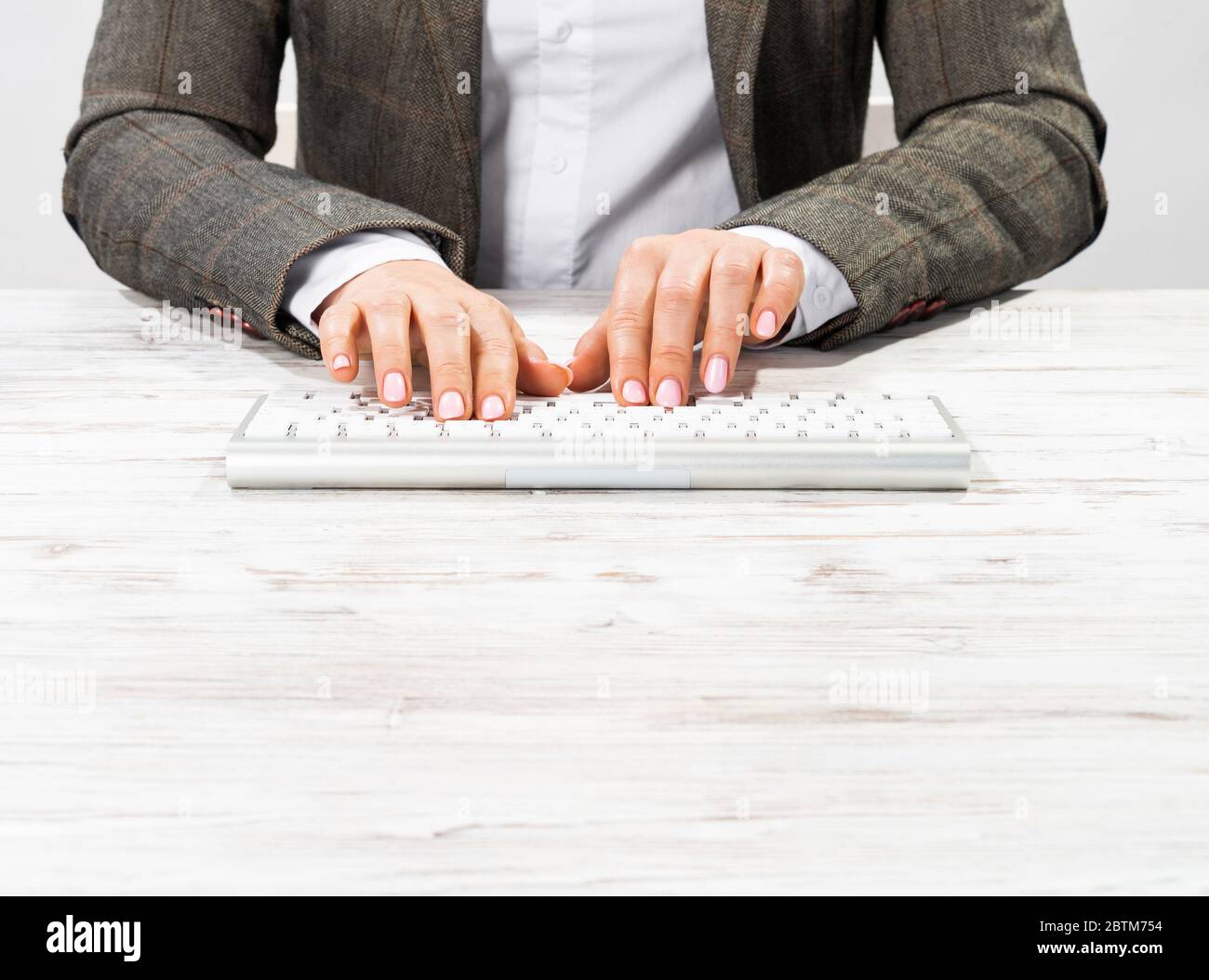 Close up woman hands typing on computer keyboard Stock Photo - Alamy