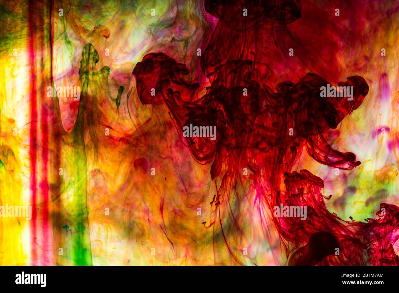 Acrylic colors and ink in water. Abstract background Stock Photo - Alamy