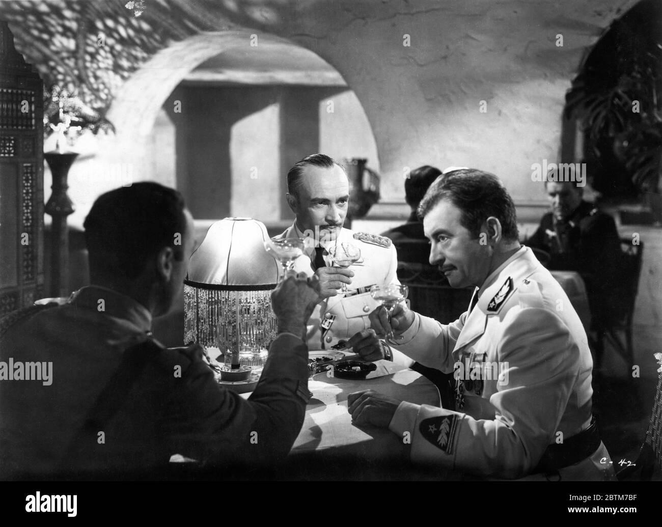 CONRAD VEIDT as Major Strasser and CLAUDE RAINS as Captain Louis ...