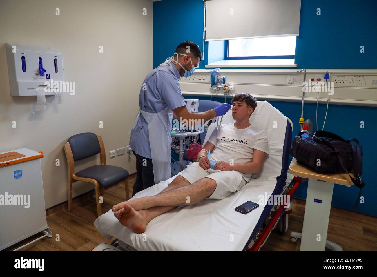 Patient Chay Godfrey is treated by staff nurse Elia Sarno in the ...