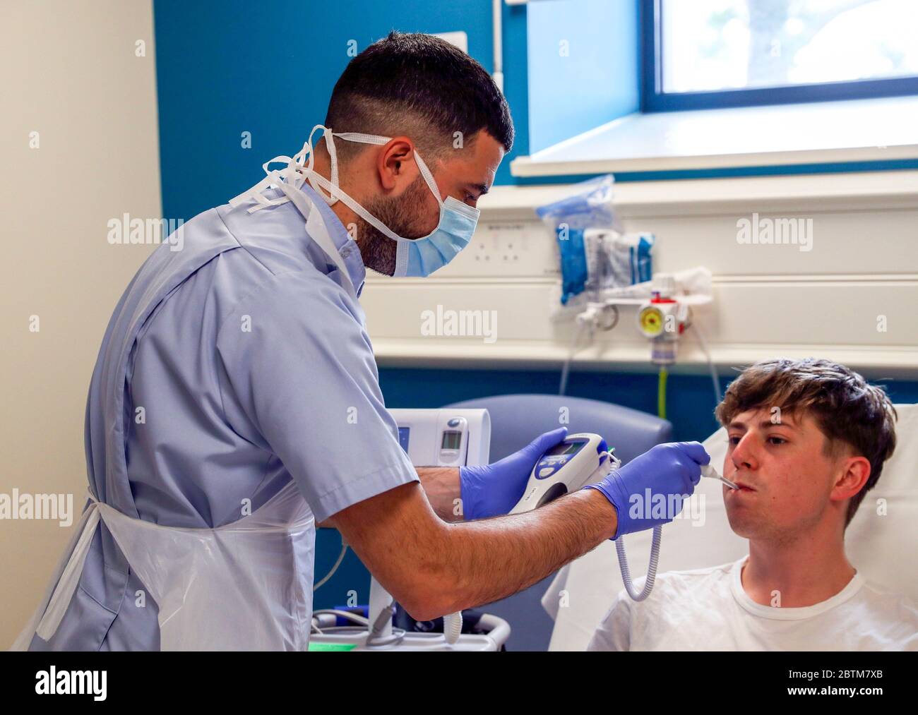 Patient Chay Godfrey is treated by staff nurse Elia Sarno in the ...