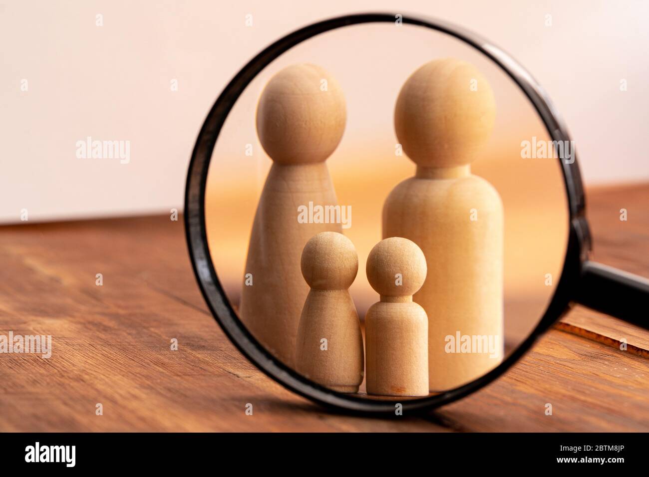Small wooden figures of family members. Family relationship symbol ...