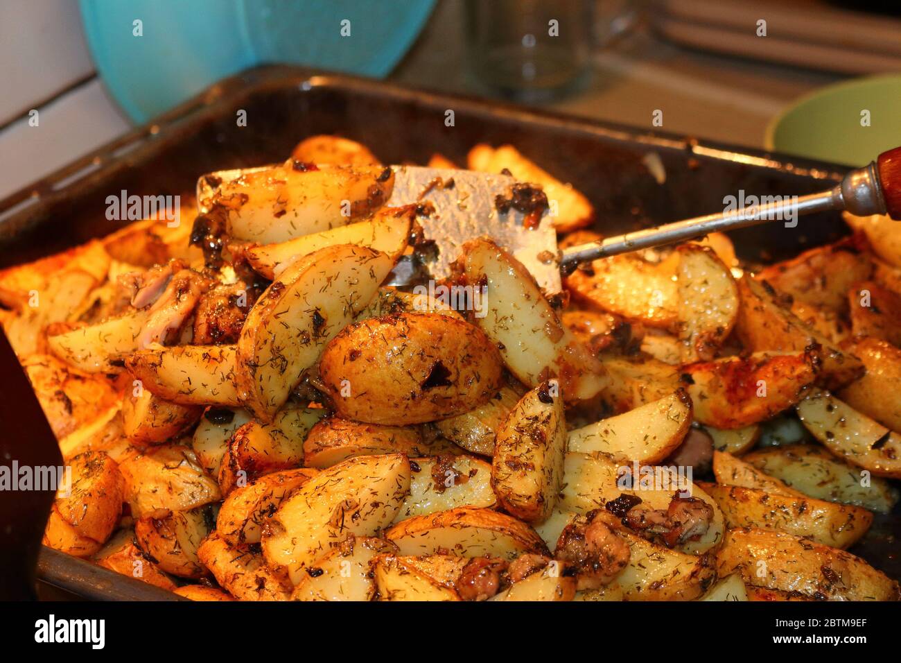 Baked potatoes with Provencal herbs Stock Photo - Alamy