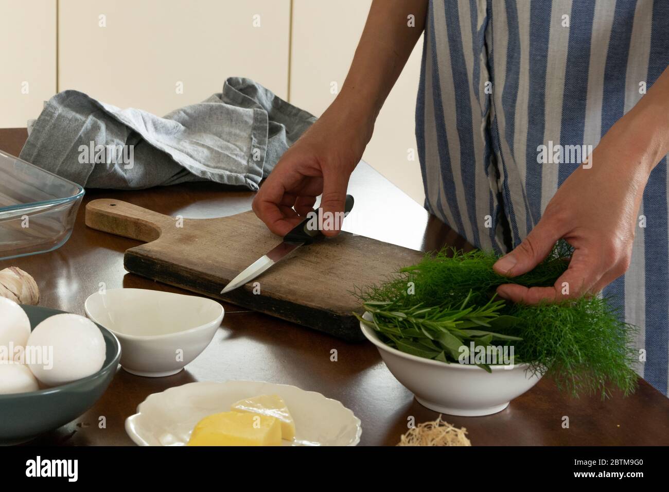 Person cooking eggs hi-res stock photography and images - Alamy