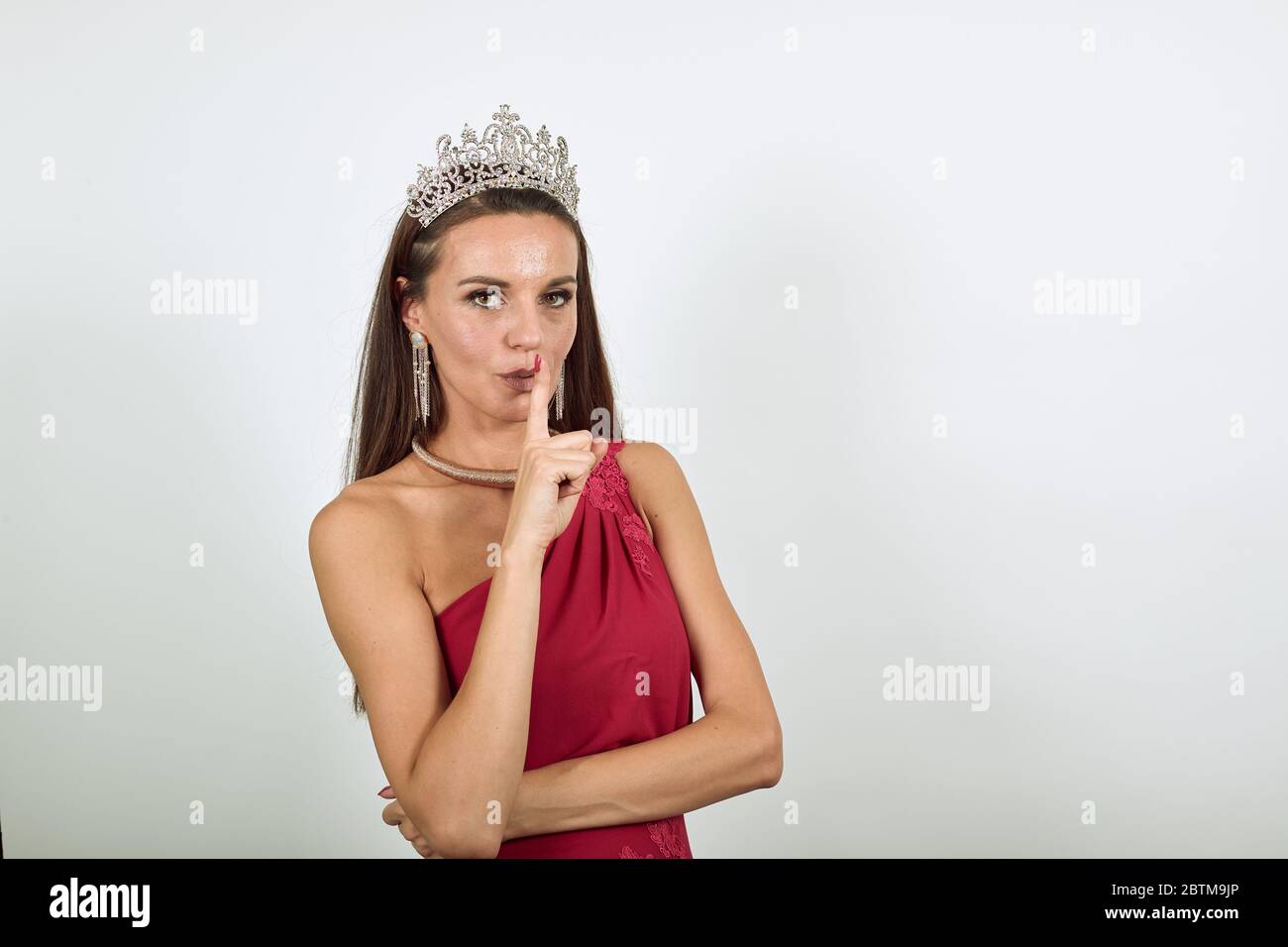 Secret Female Holds Forefinger To Mouth And Protit Silence. Mysterious ...