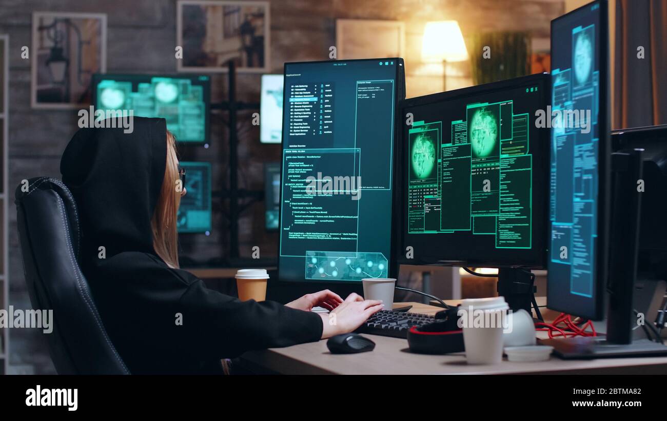 Hacker girl using dangerous malware hi-res stock photography and images ...