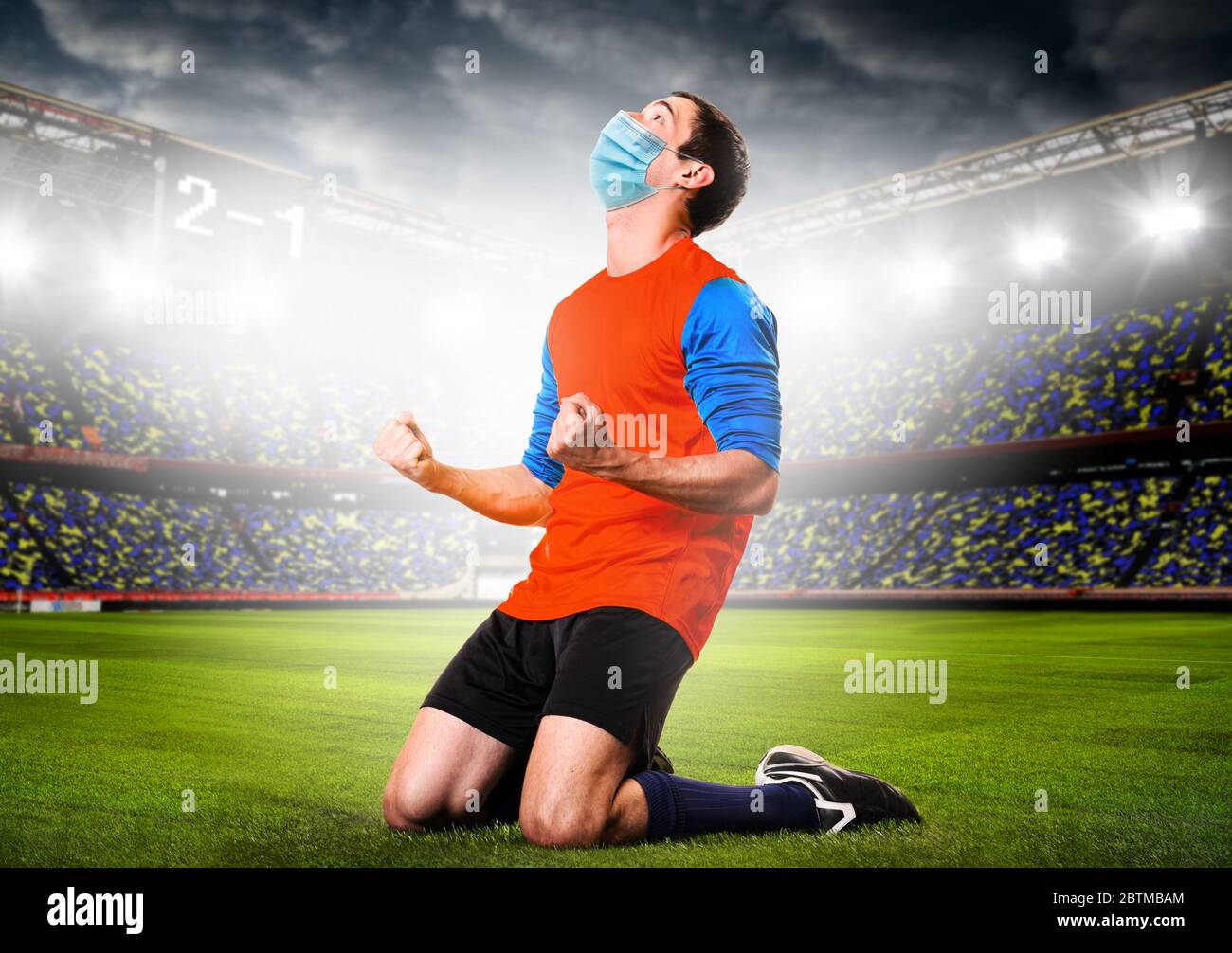 Soccer or football player in mask Stock Photo - Alamy