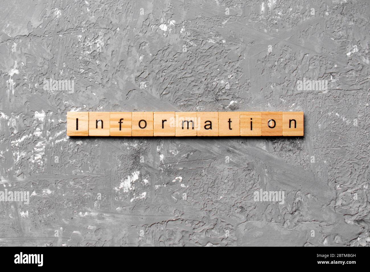 Information word written on wood block. Information text on cement ...