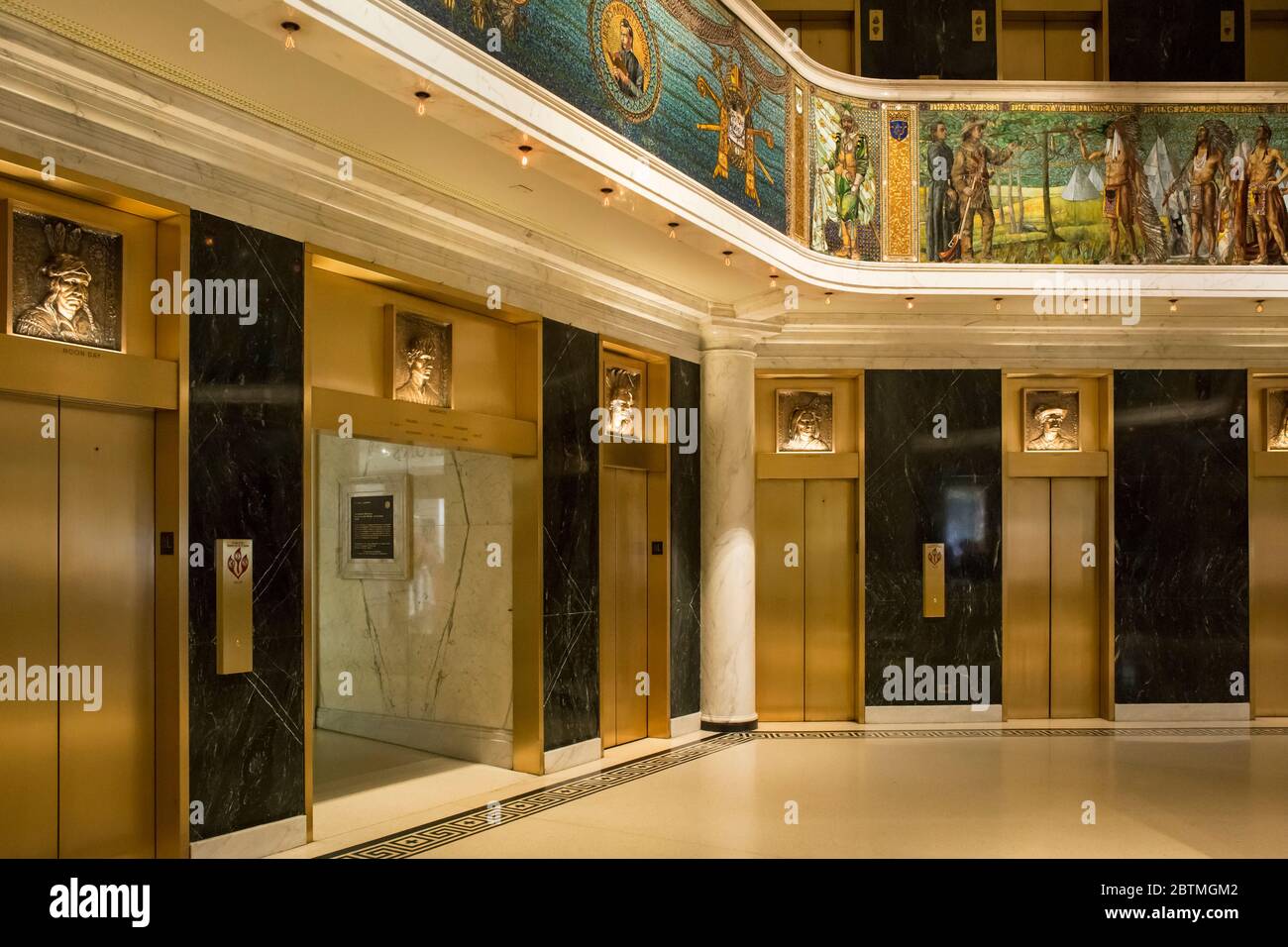 Part Of The Beautiful Vintage Lobby Of The Marquette Building With Its Golden Elevators And part-of-the-beautiful-vintage-lobby-of-the-marquette-building-with-its-golden-elevators-and