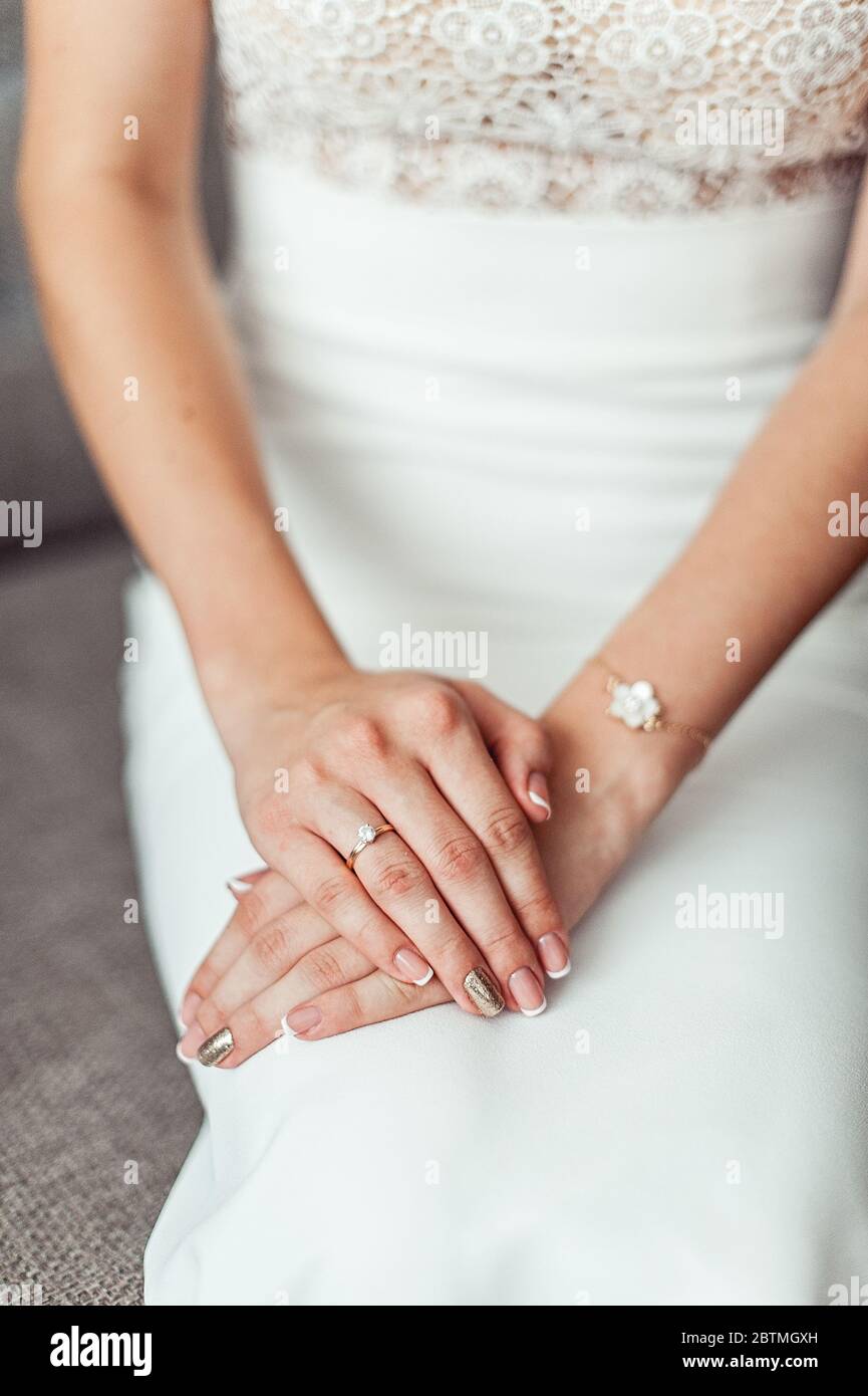 Brides hands on lap hi-res stock photography and images - Alamy
