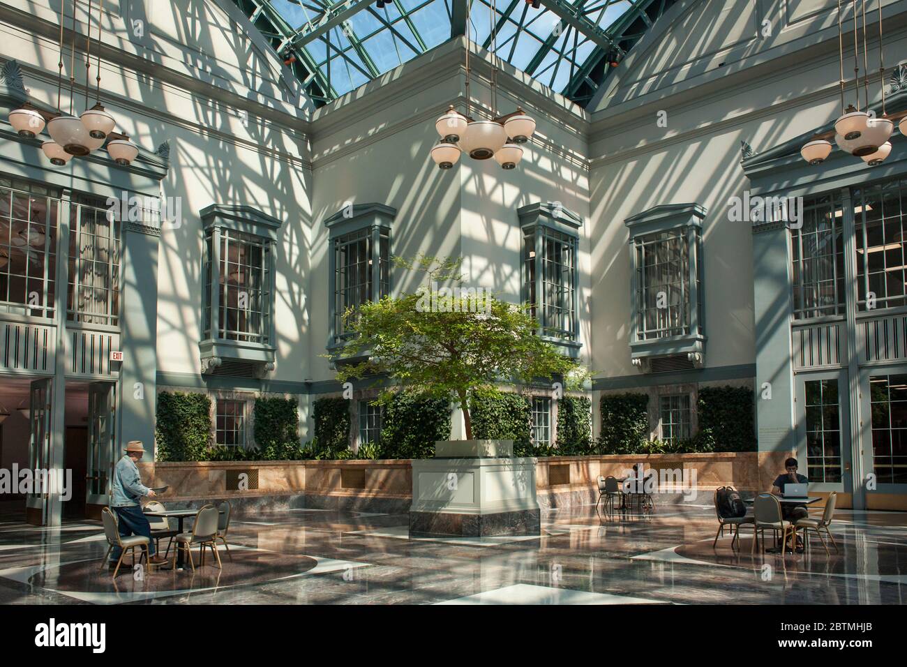 Horizontal view of the some people reading in the Harold Washington ...