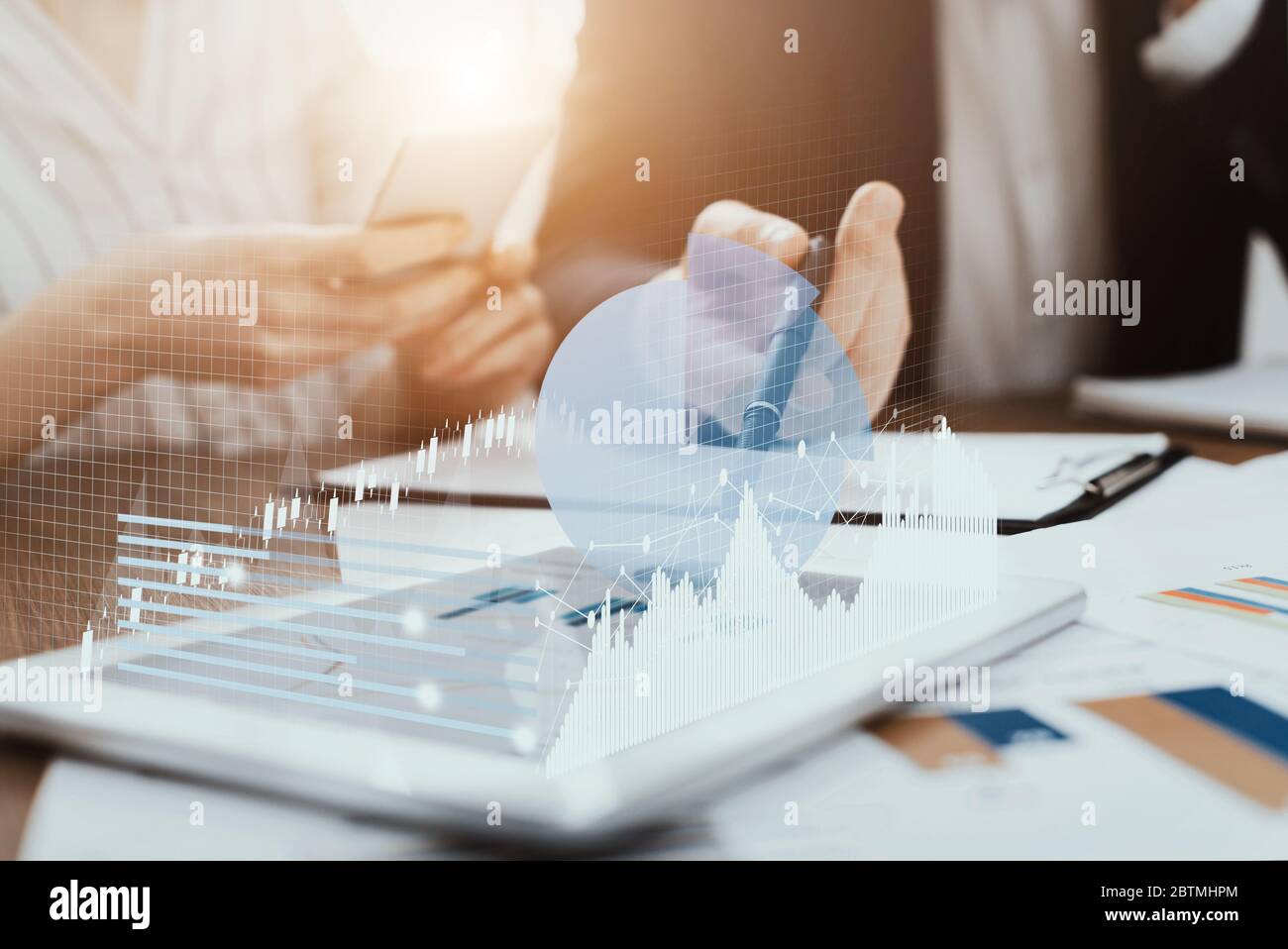 Business partners working with financial data at office, collage with ...