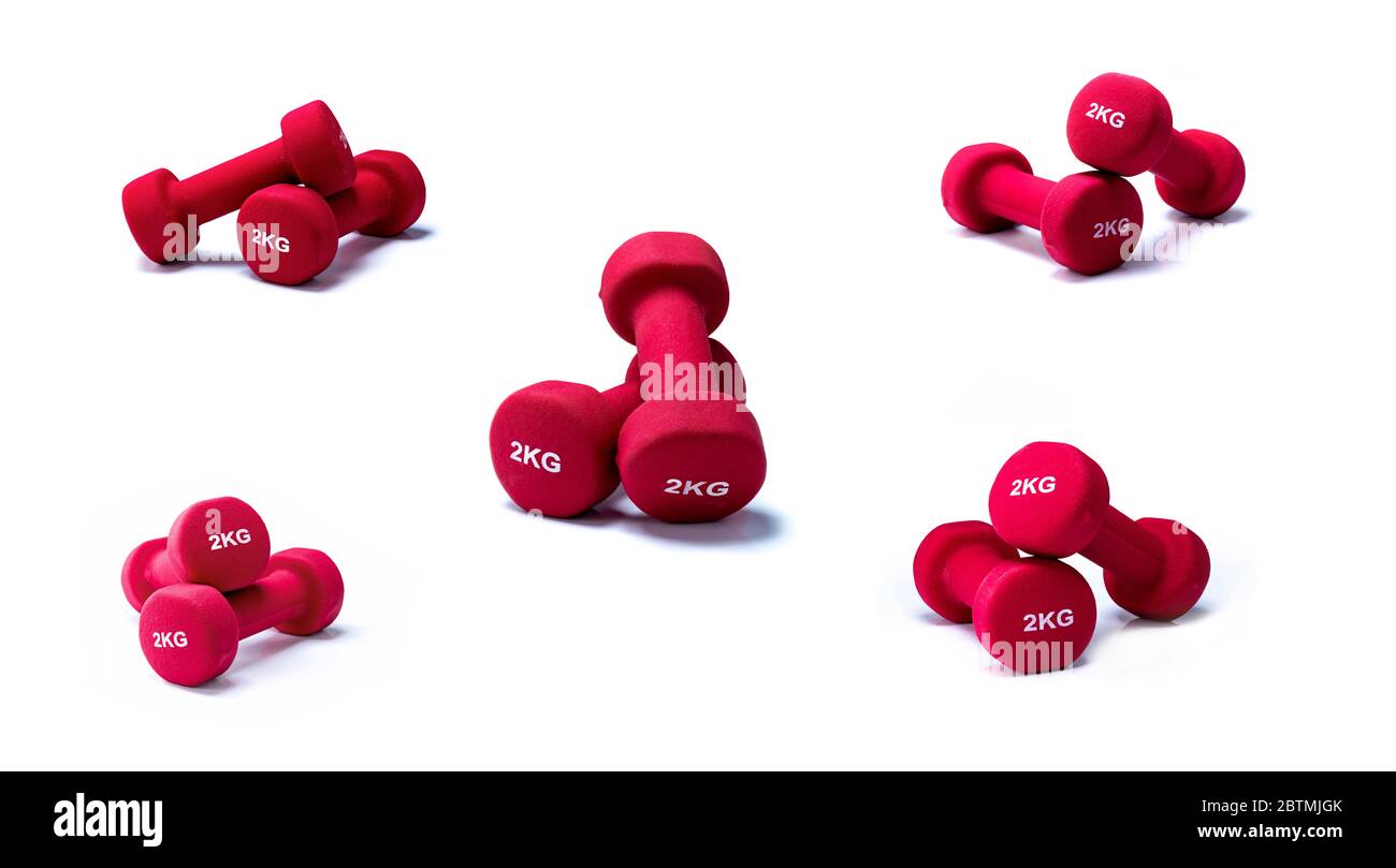 Set of red dumbbells isolated on white background. A pair of red neoprene dumbbells. Home gym ...