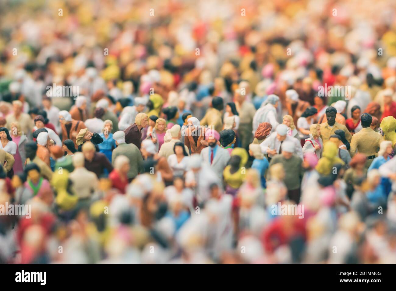 Colorful miniature crowd. Multiracial gathering of people Stock Photo ...
