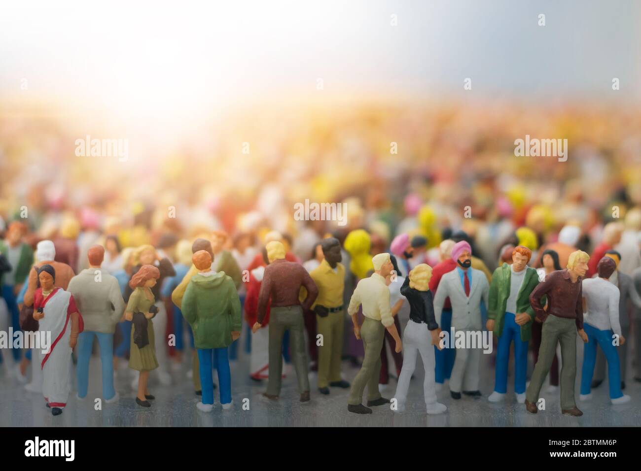 Colorful miniature crowd in the Sun. Multiracial gathering of people ...