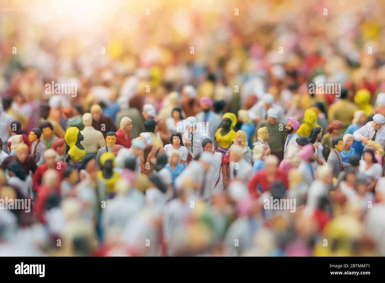 Colorful miniature crowd in the Sun. Multiracial gathering of people ...