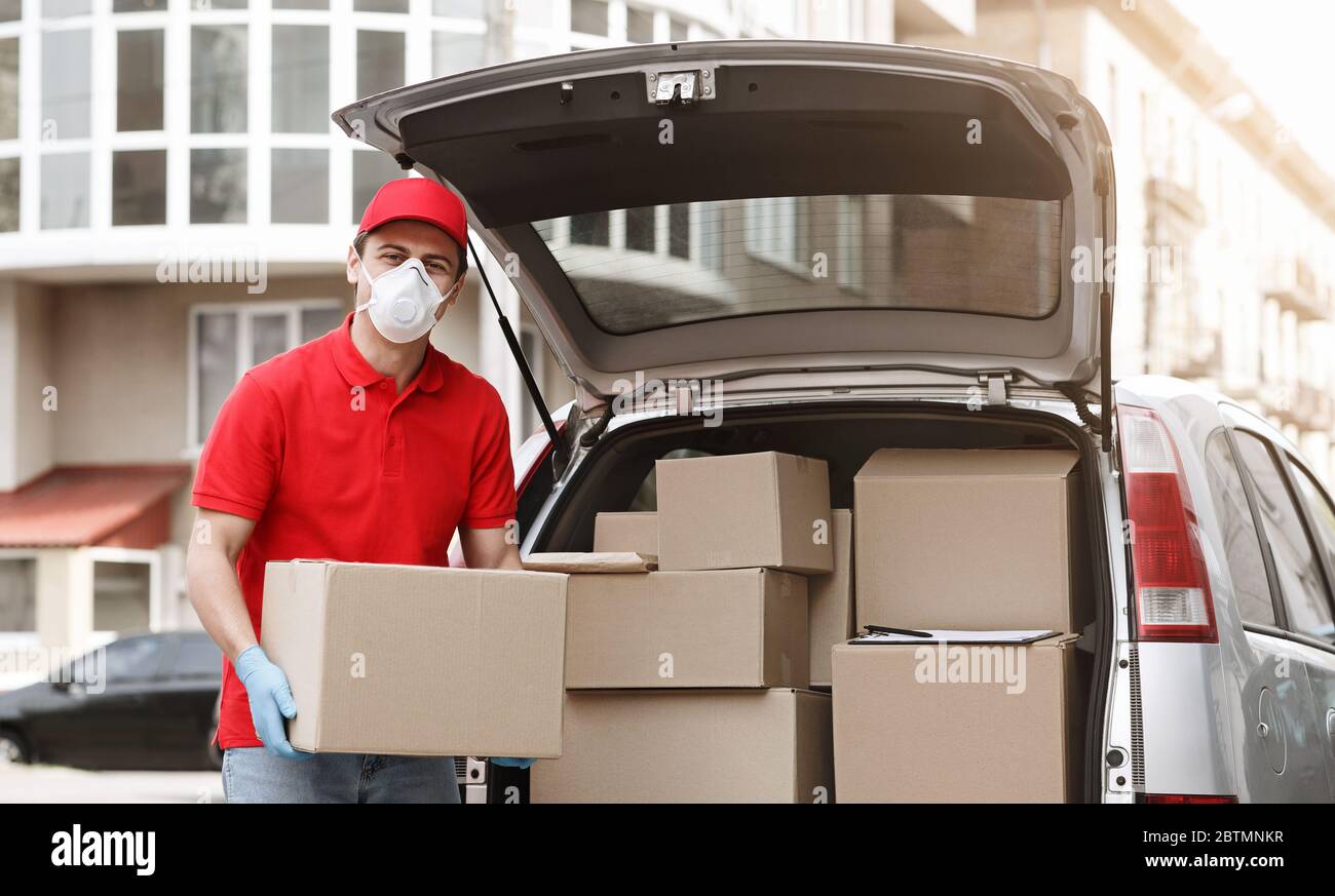Fast delivery of parcels to house during pandemic concept. Deliveryman ...