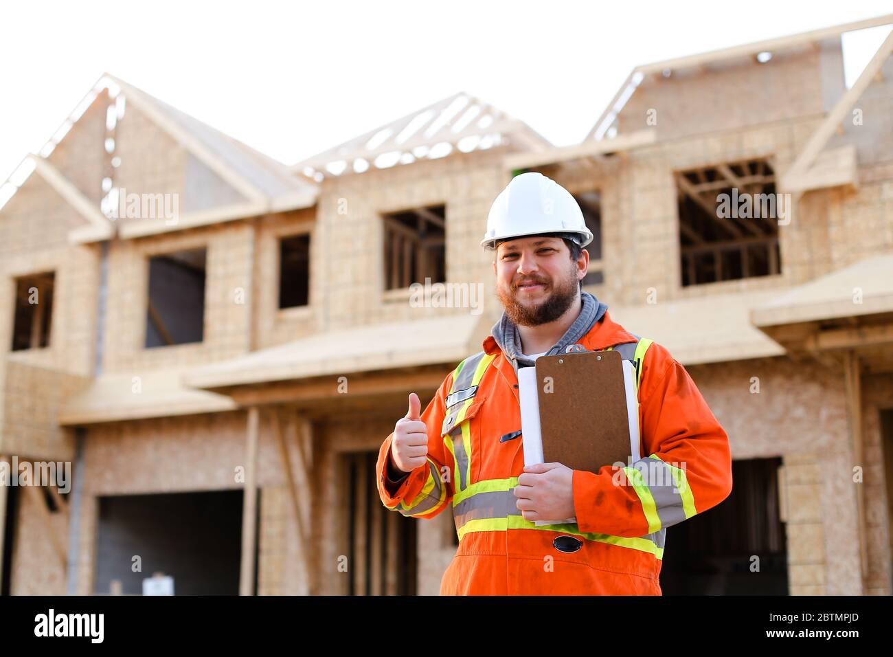 Foreman holding paper pen hi-res stock photography and images - Alamy