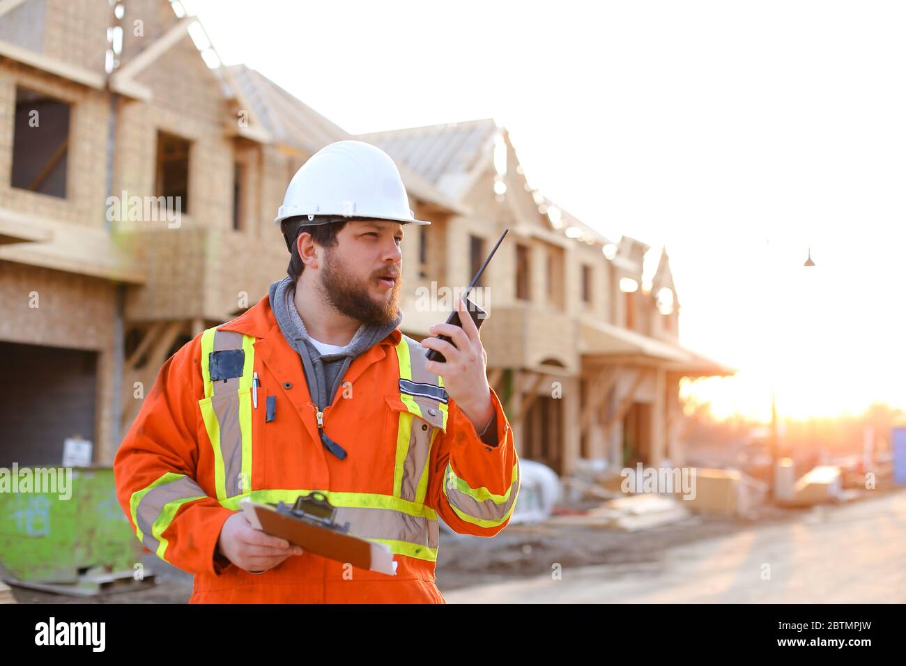 Entrepreneur on construction site using hi-res stock photography and ...