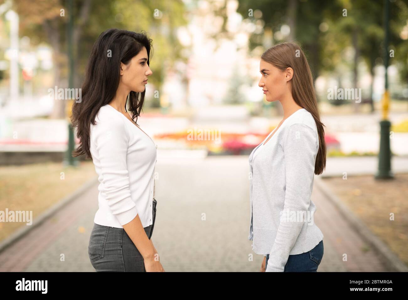 Two Girls Friends Having Conflict Standing Outdoors After Quarrel Stock ...