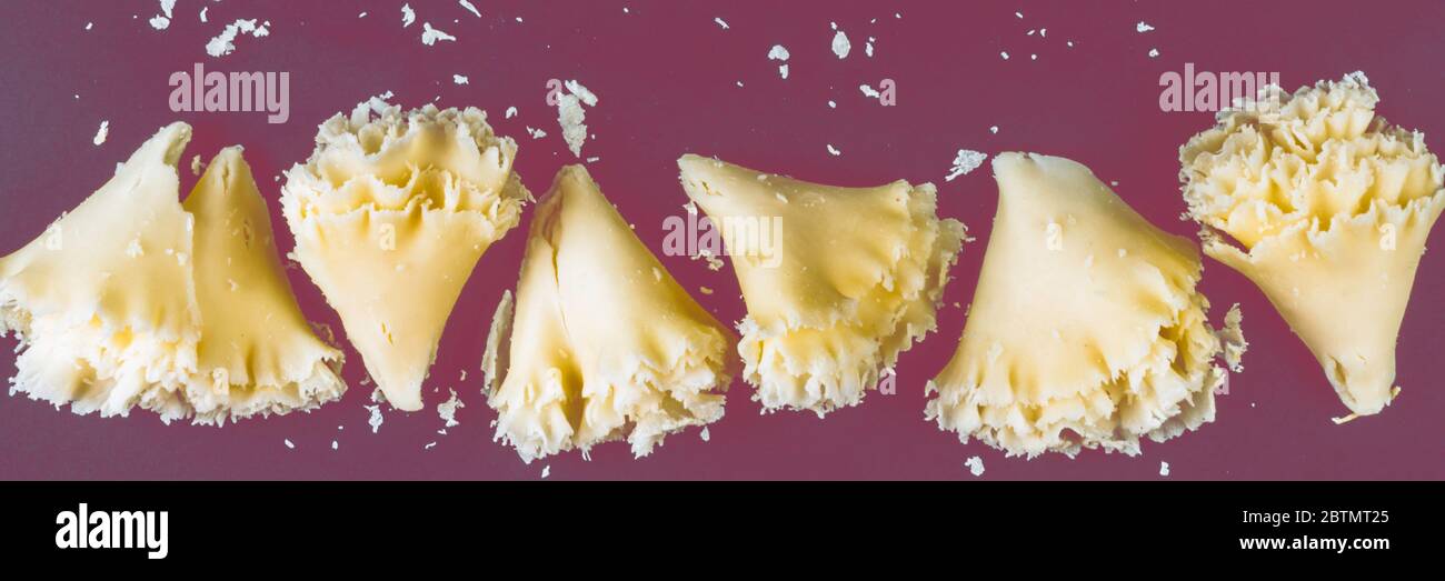 Swiss cheese Tete de Moine or monastery monk's head, scraped with a ...