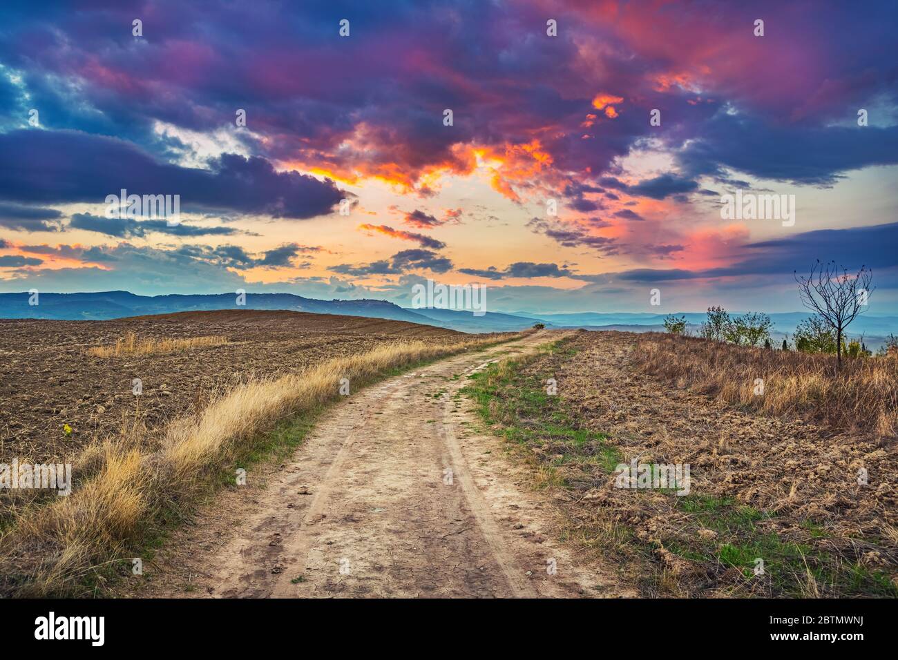 Colorful Tuscany sunset Stock Photo - Alamy