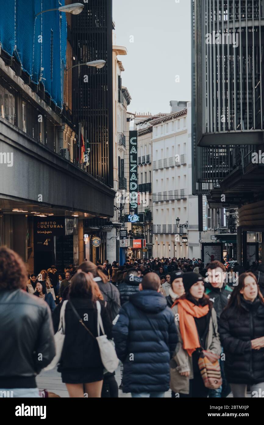 Madrid, Spain - January 26, 2020: Row of shops on a busy street in ...