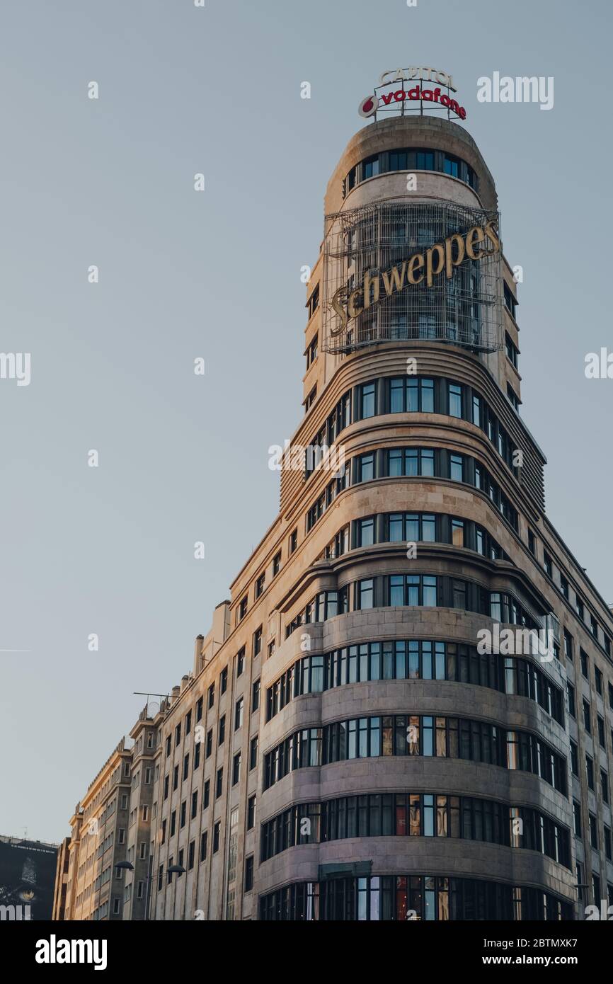 Madrid, Spain - January 26, 2020: Low angle view of Edificio Capitol on Gran Via, one of the ...