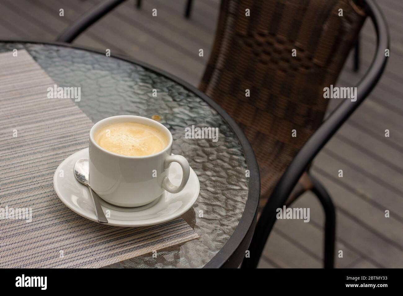 Mug of coffee in a summer cafe. Luxury rest Stock Photo - Alamy