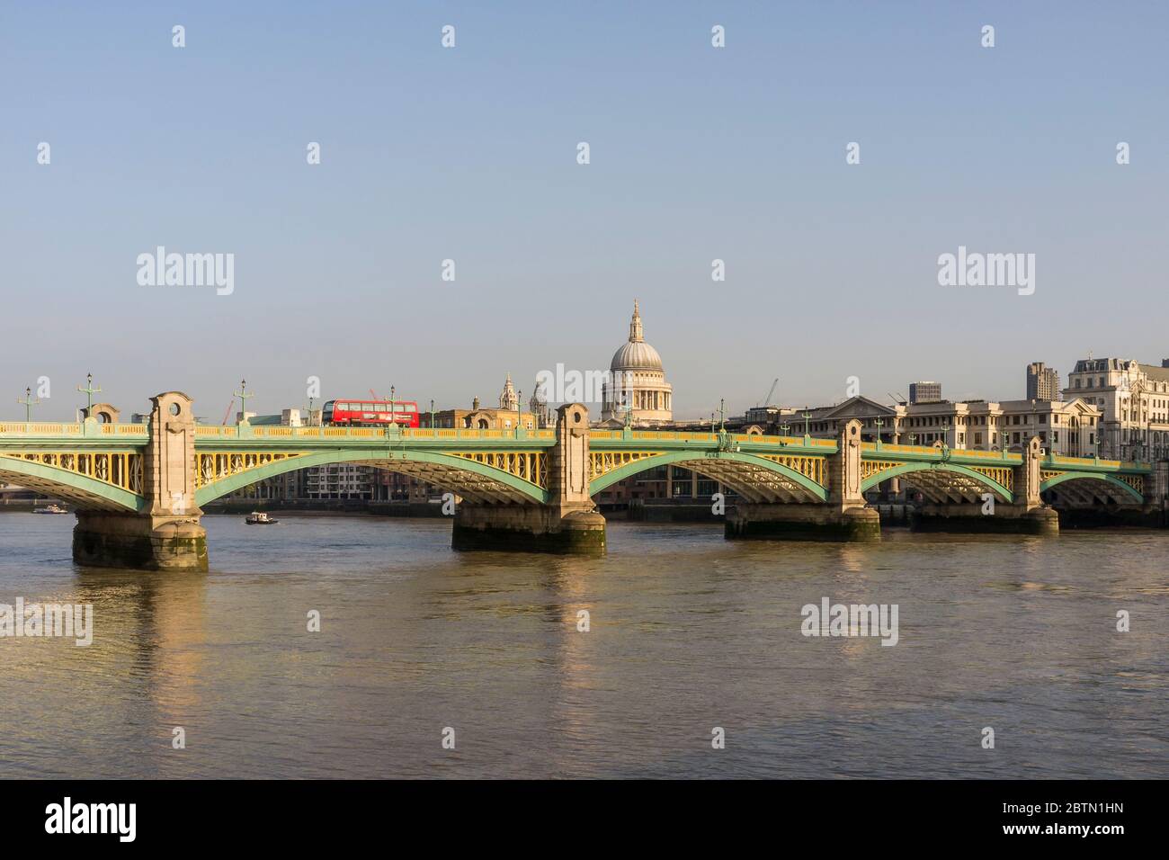 Southwark Bridge, with St. Paul's Cathedral in the background, over the ...